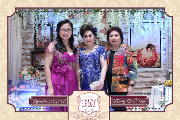 The Wedding of Fandy & Nova by After 5 Photobooth | Bridestory.com